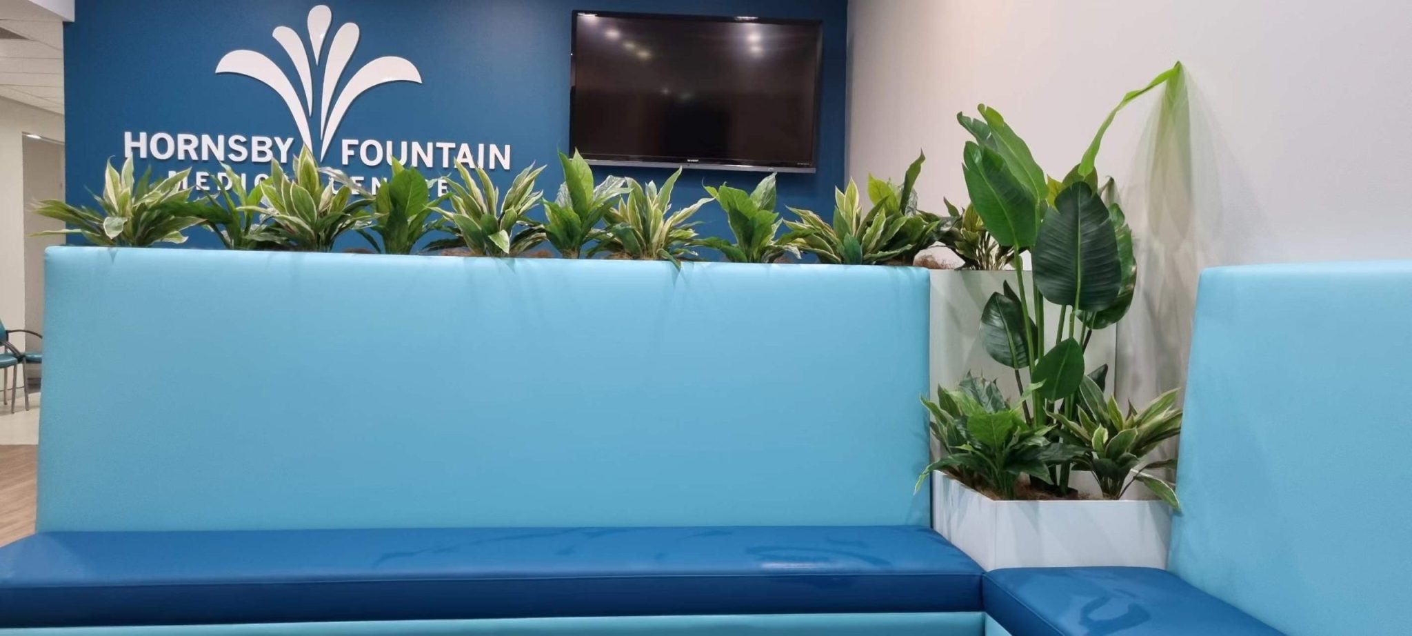 Clinic Reception Banquette Seating and Planter box Custom Made at ...